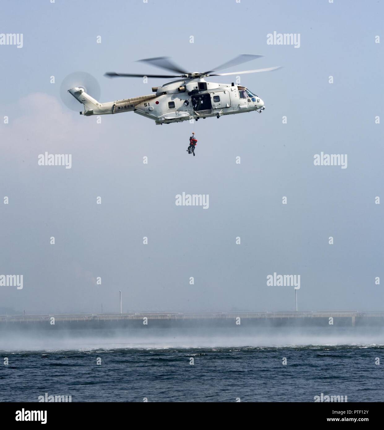 Japan Martime Self-Defense Force (JMSDF) personnel conduct water ...