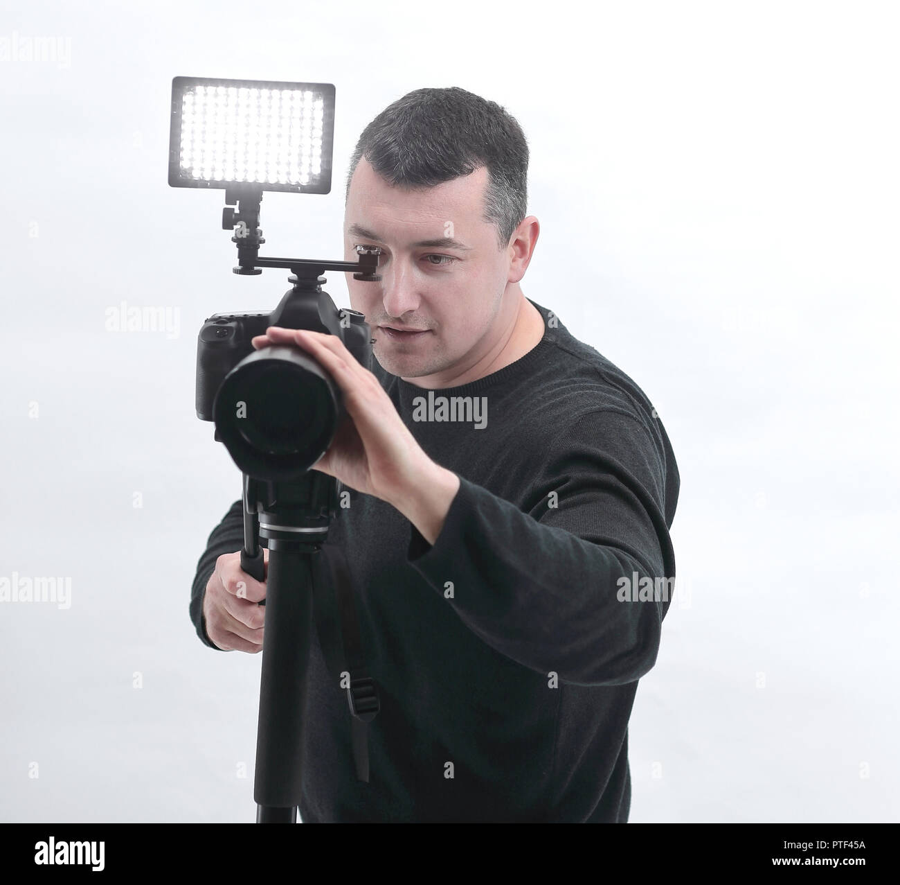 portrait of a successful photographer .isolated on white background ...