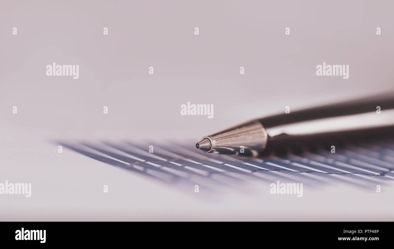 business background. blurred image pen and financial chart Stock Photo ...