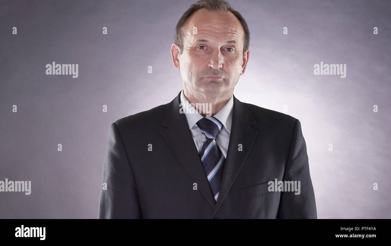 portrait of a modern businessman.isolated on black background Stock ...