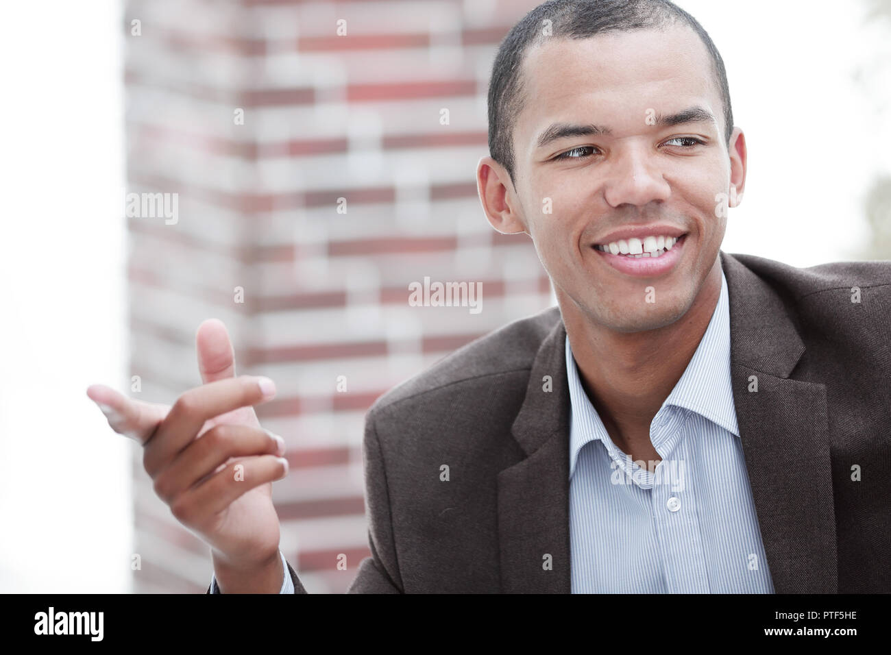 closeup .smiling businessman showing forward.photo with copy space ...