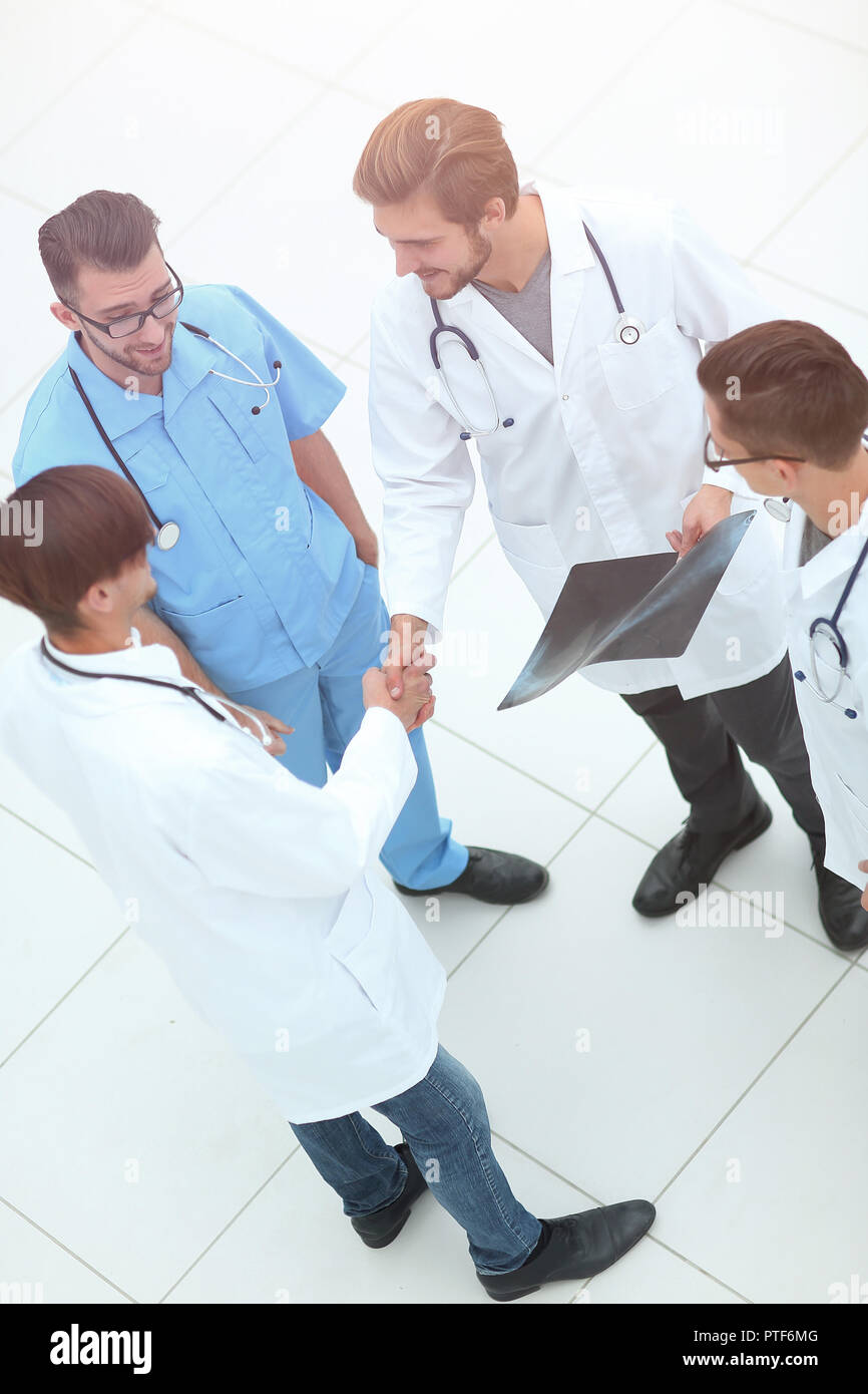 handshake two doctors at the meeting Stock Photo - Alamy