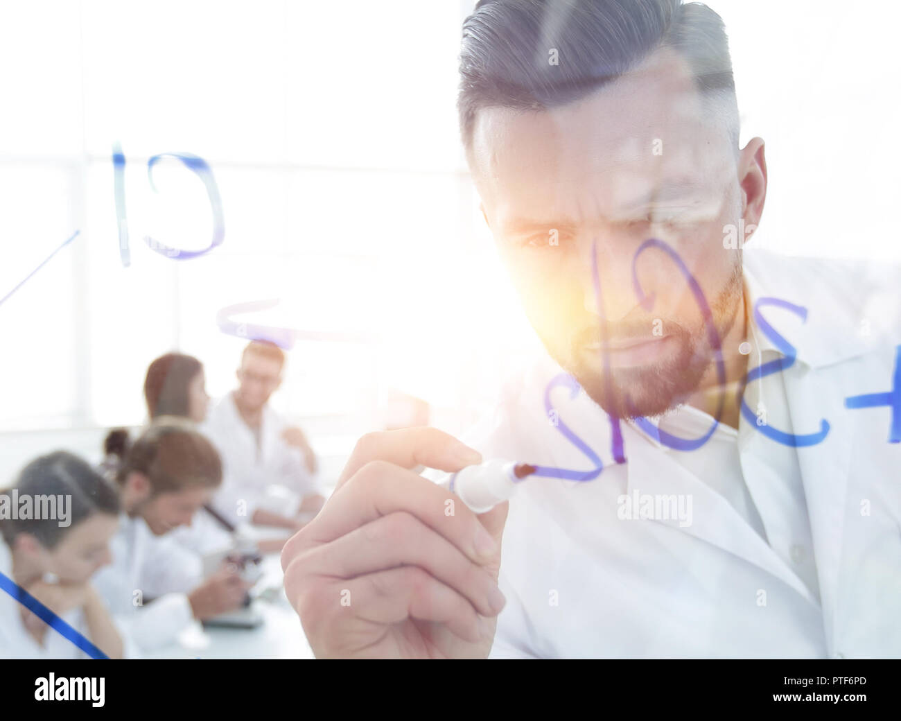 close up of a Man scientist working with formulas Stock Photo - Alamy
