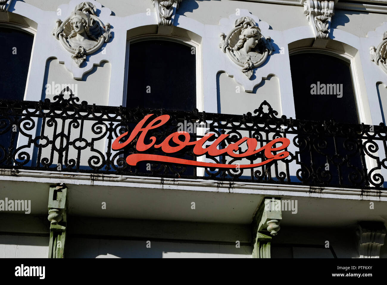 house lettering sign on decorative wrought iron balcony railings Stock ...