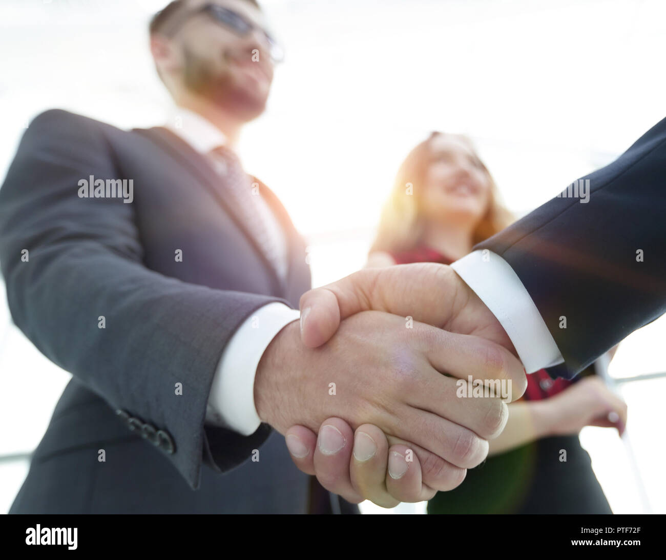 Businessmen making handshake - business etiquette, congratulatio Stock ...