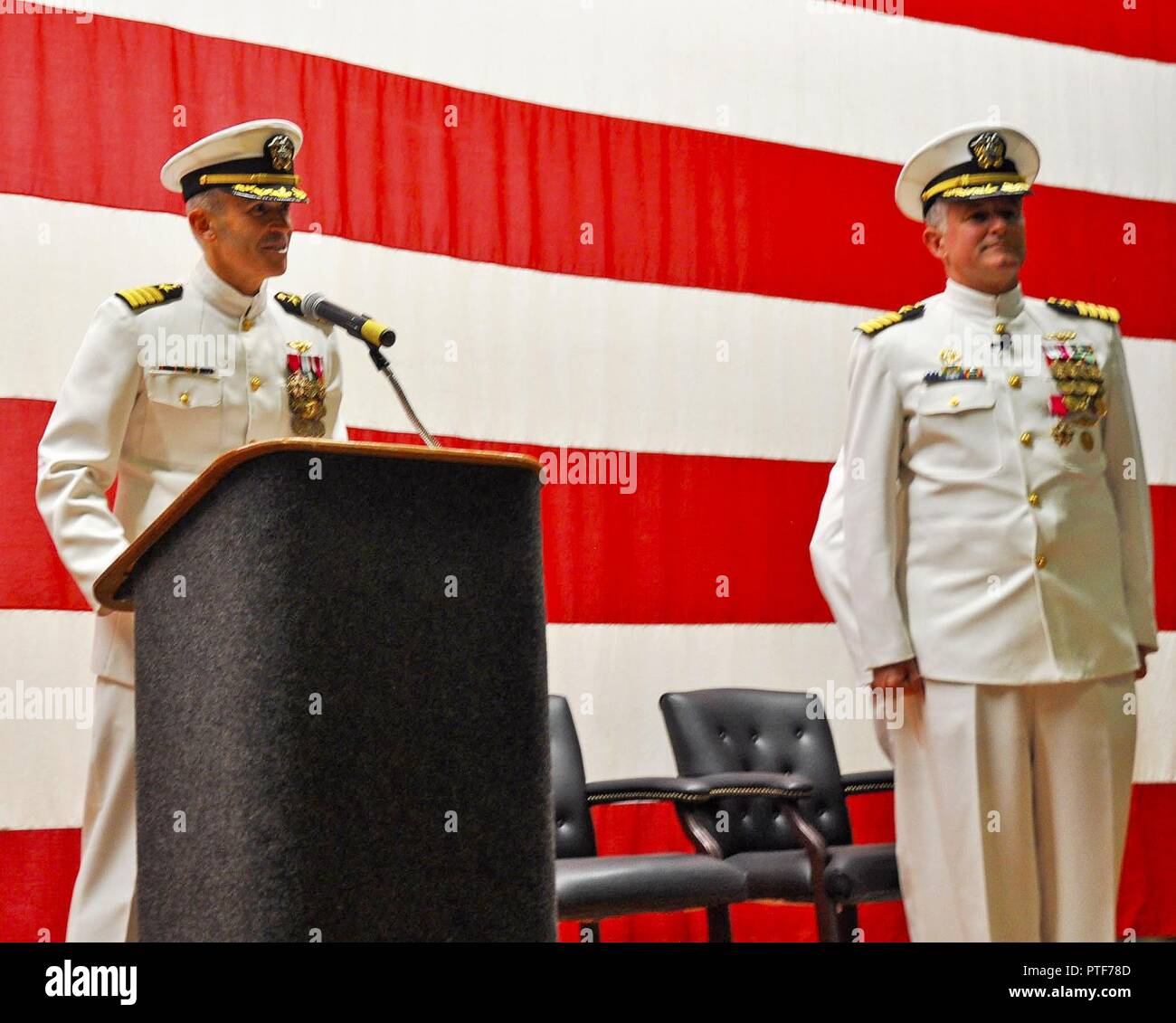 Capt. Philip Brock reads through his official orders appointing him as ...