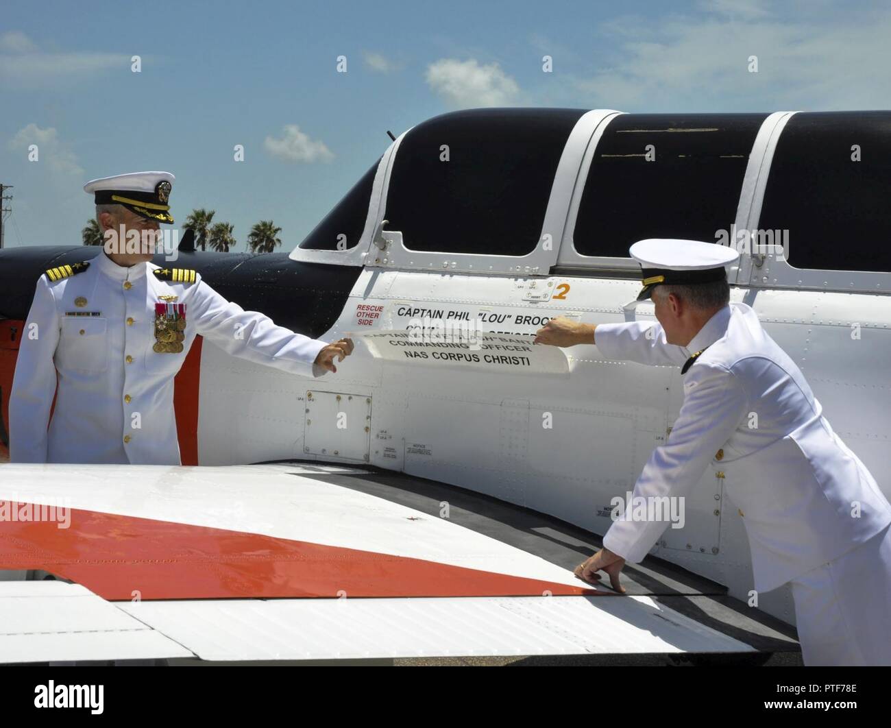 Capt. Philip Brock, commanding officer, NASCC, and Capt. Steve Banta ...
