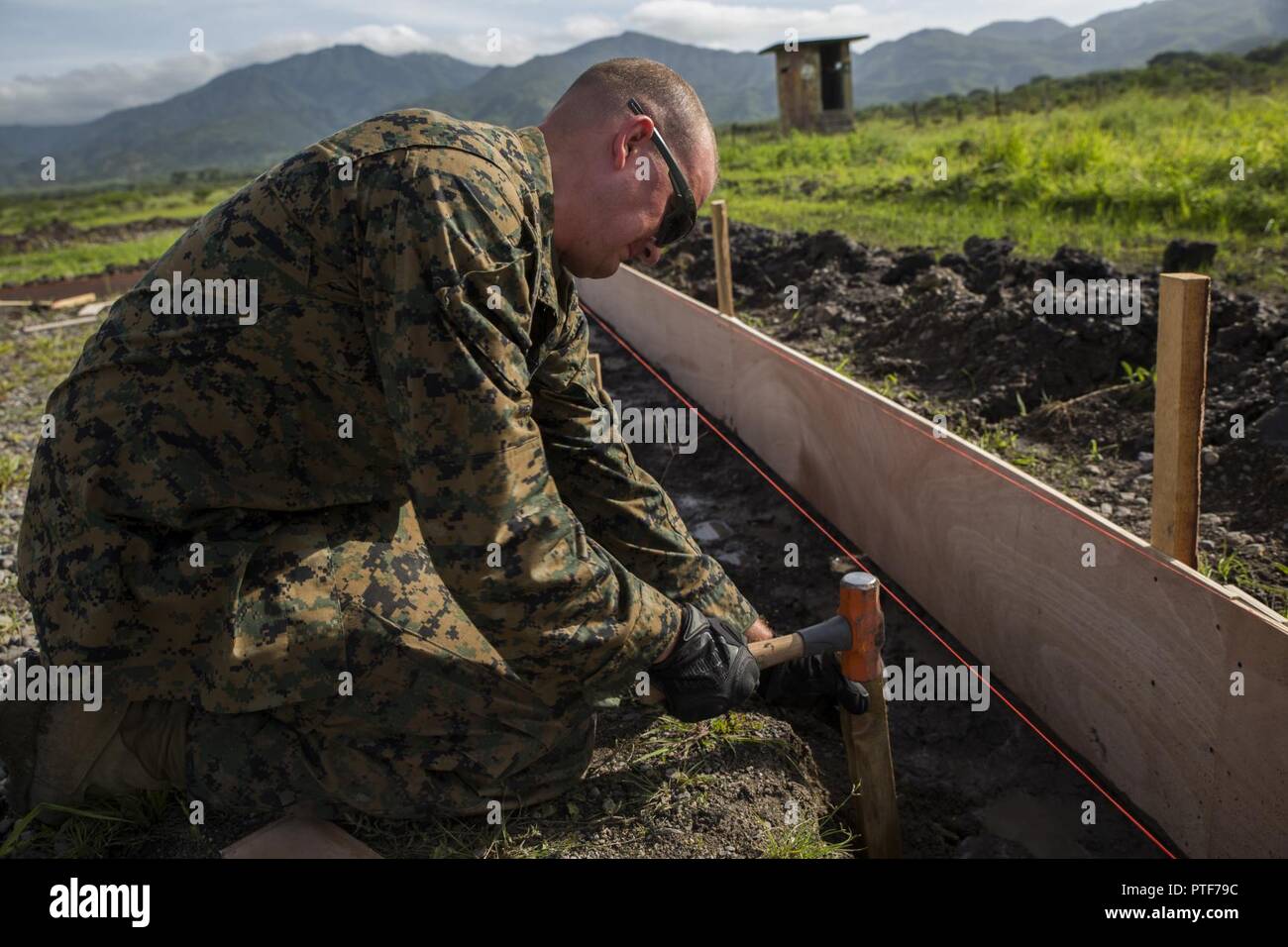 U.S. Marine Lance Cpl. James J. Kosek, a motor transportation mechanic ...