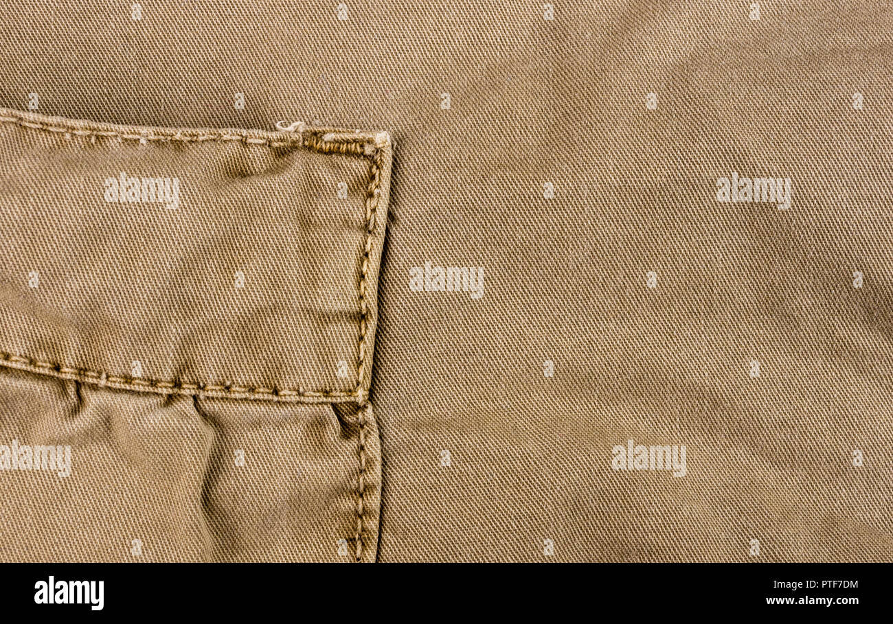 clothing items washed cotton fabric texture with seams, macro, close-up ...