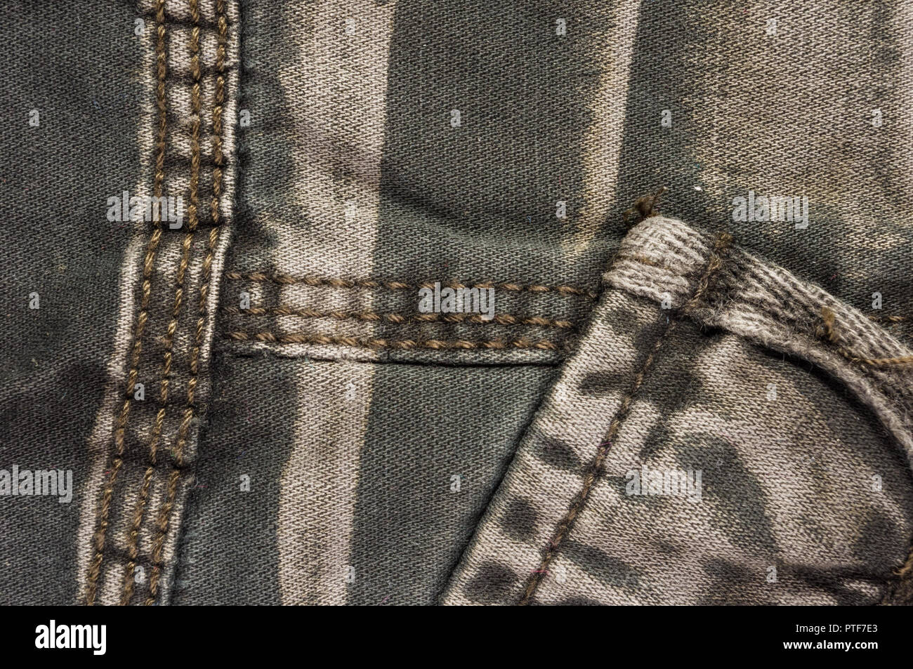 clothing items washed cotton fabric texture with seams, macro, close-up ...