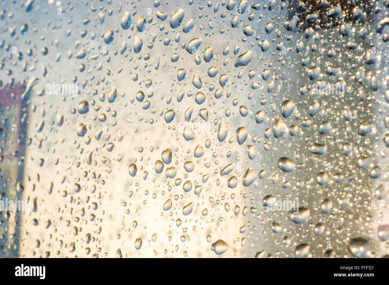 background of raindrops on window glass, close-up Stock Photo - Alamy
