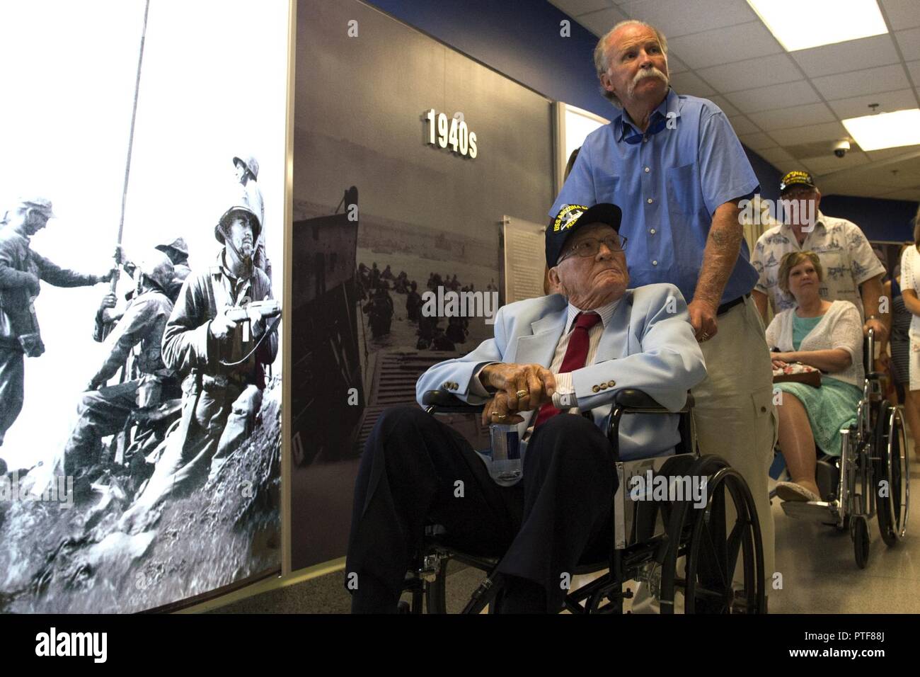 USS Arizona survivor Navy Seaman First Class Donald Stratton, seated ...