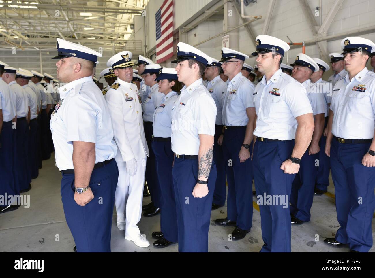 Coast Guard Capt. Michael E. Platt and Capt. Todd W. Lutes conduct a ...