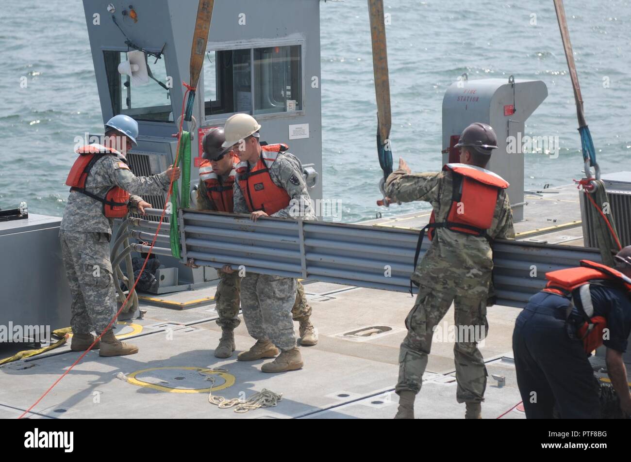Soldiers of the 331st Transportation Company (Causeway) assemble a ...