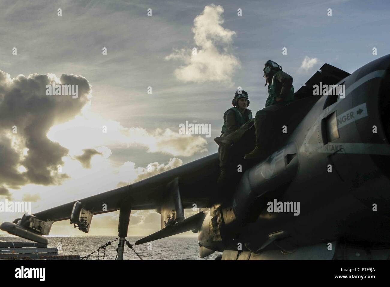 PACIFIC OCEAN – Cpl. Luis Soldono and Cpl. Garnet Burgess avionic ...