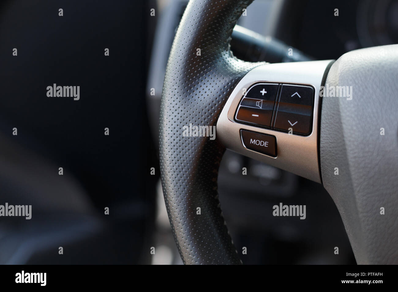 Control buttons on steering wheel in a modern car, close Stock Photo ...