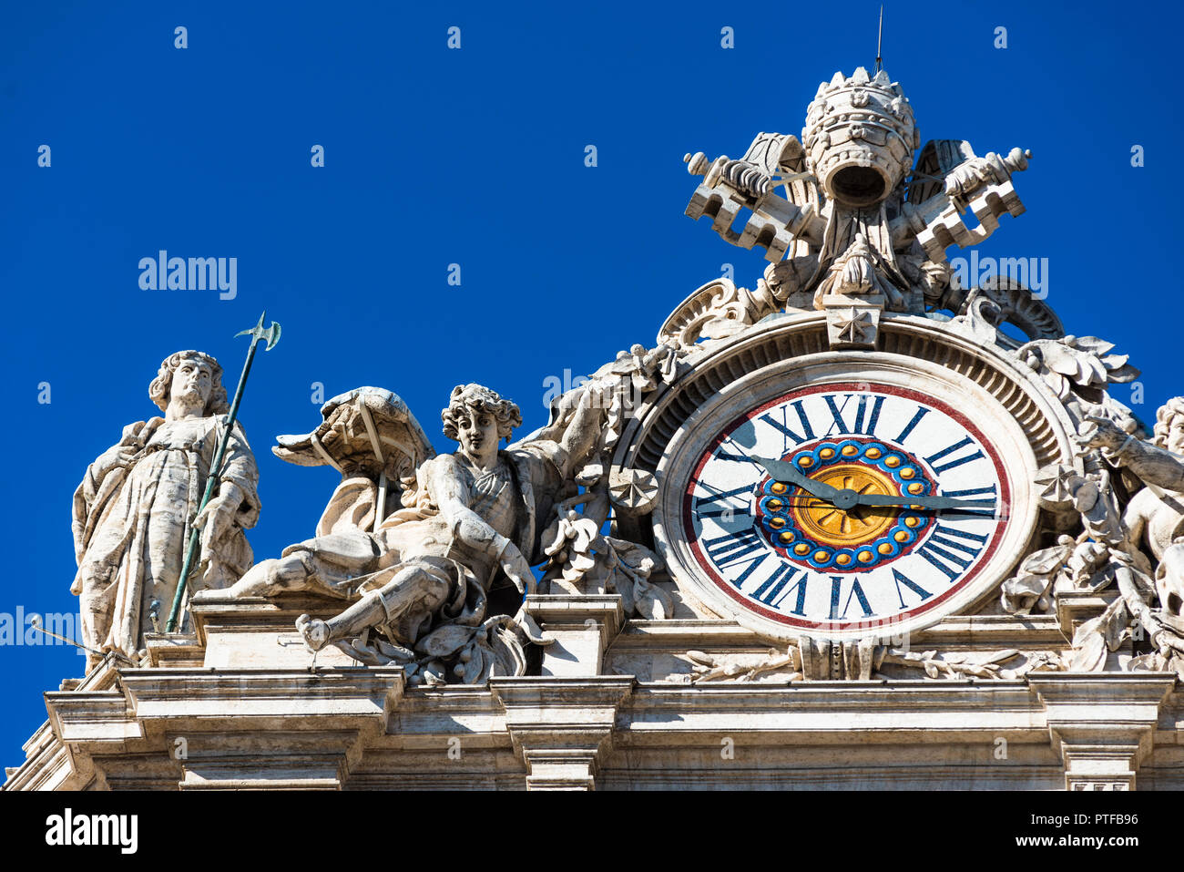 Statues and clock on St Paul's Cathedral, Vatican city, Rome, Italy ...