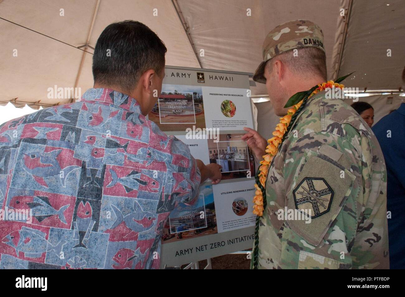 WAHIAWA, Hawaii — David Cho (left), a legislative aid with Sen. Donovan ...