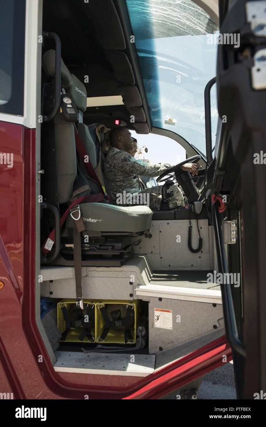 U.S. Air Force Senior Airman Korey Wilson and Yuhei Tajima, 18th Civil ...
