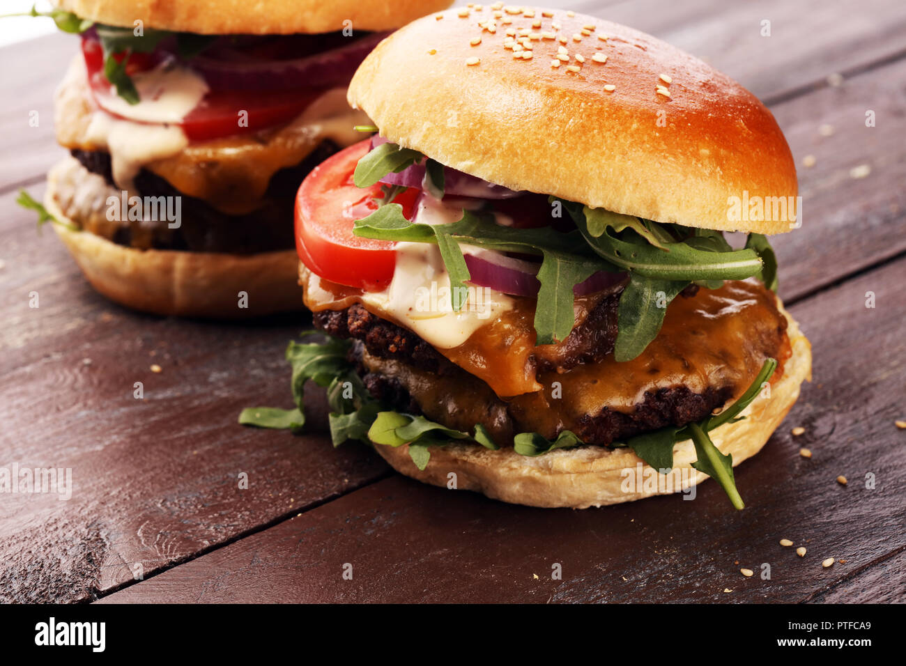 Tasty fresh meat burgers with salad and cheese. Homemade angus burger ...