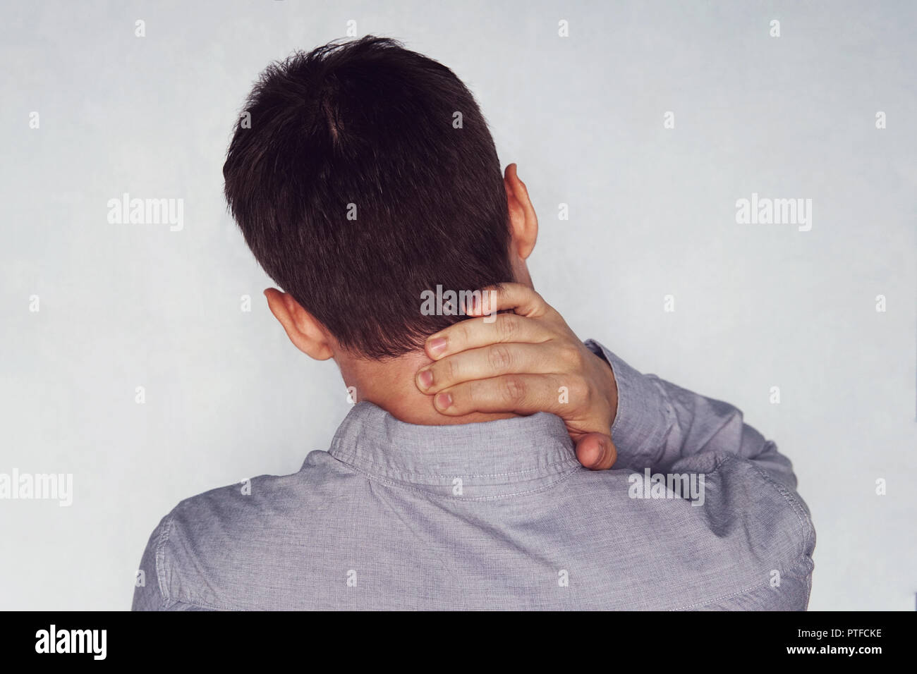 Businessman neck pain after working in the office too long time ...