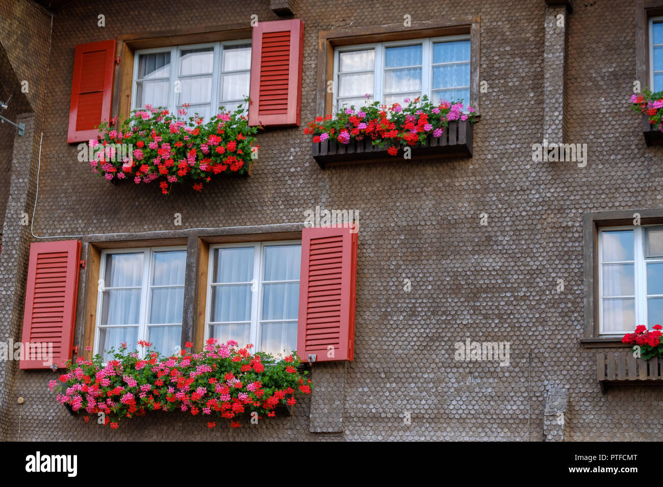 Typical Switzerland wooden house windows Stock Photo - Alamy
