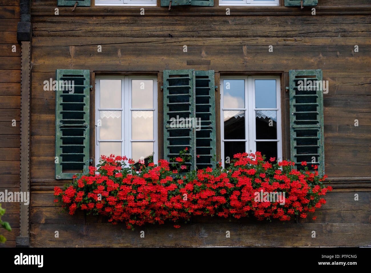 Typical Switzerland wooden house windows Stock Photo - Alamy