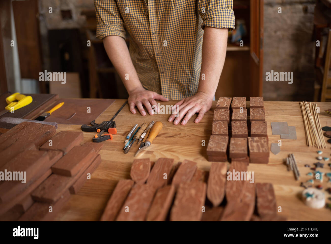 Close-up view of a wood carpenter's hands Stock Photo - Alamy
