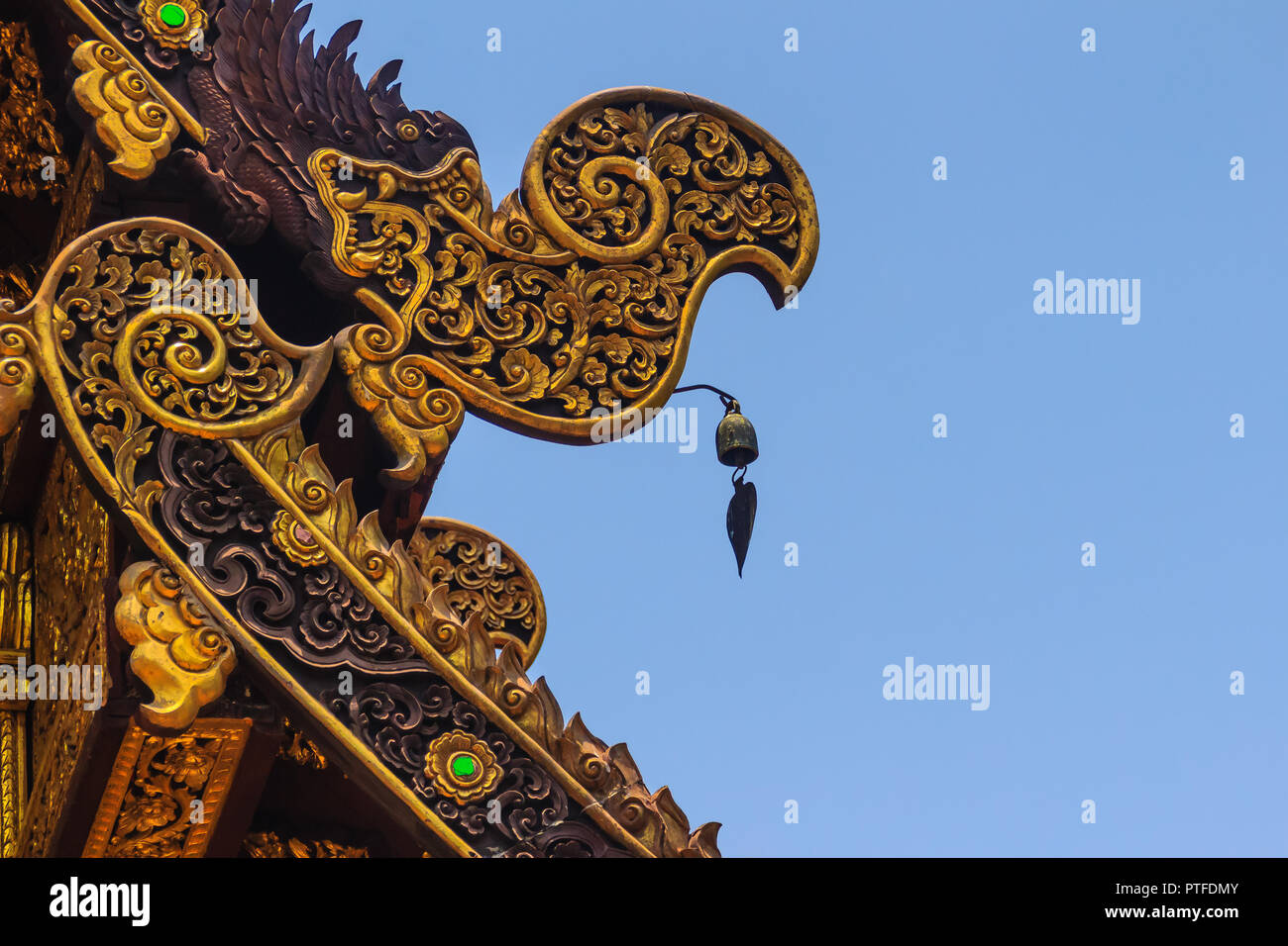 Beautiful craved naga pattern on the rafter and gable of the Thai's ...