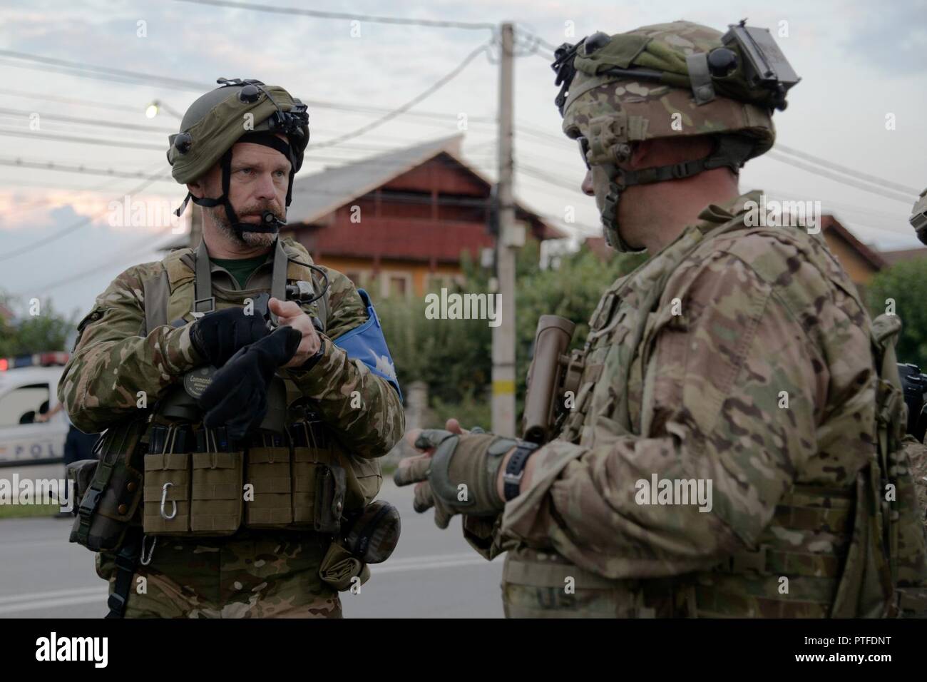 U.S. Army Lt. Col. Jeffery Searl (right), commander of the 709th ...