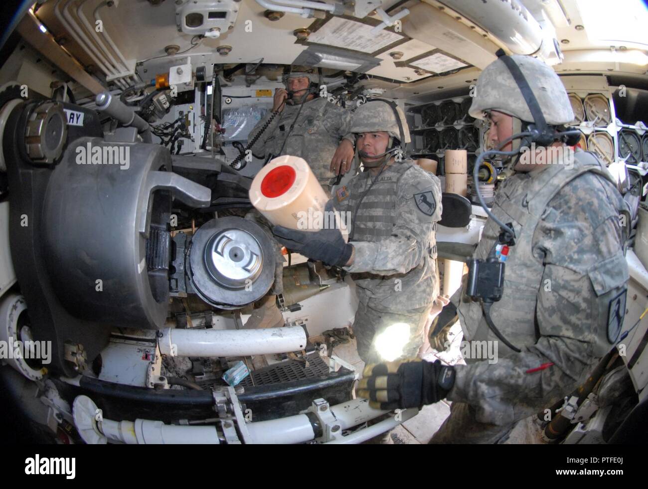 Sgt. Franklin Villalta, gunner and first man, center, of the California ...