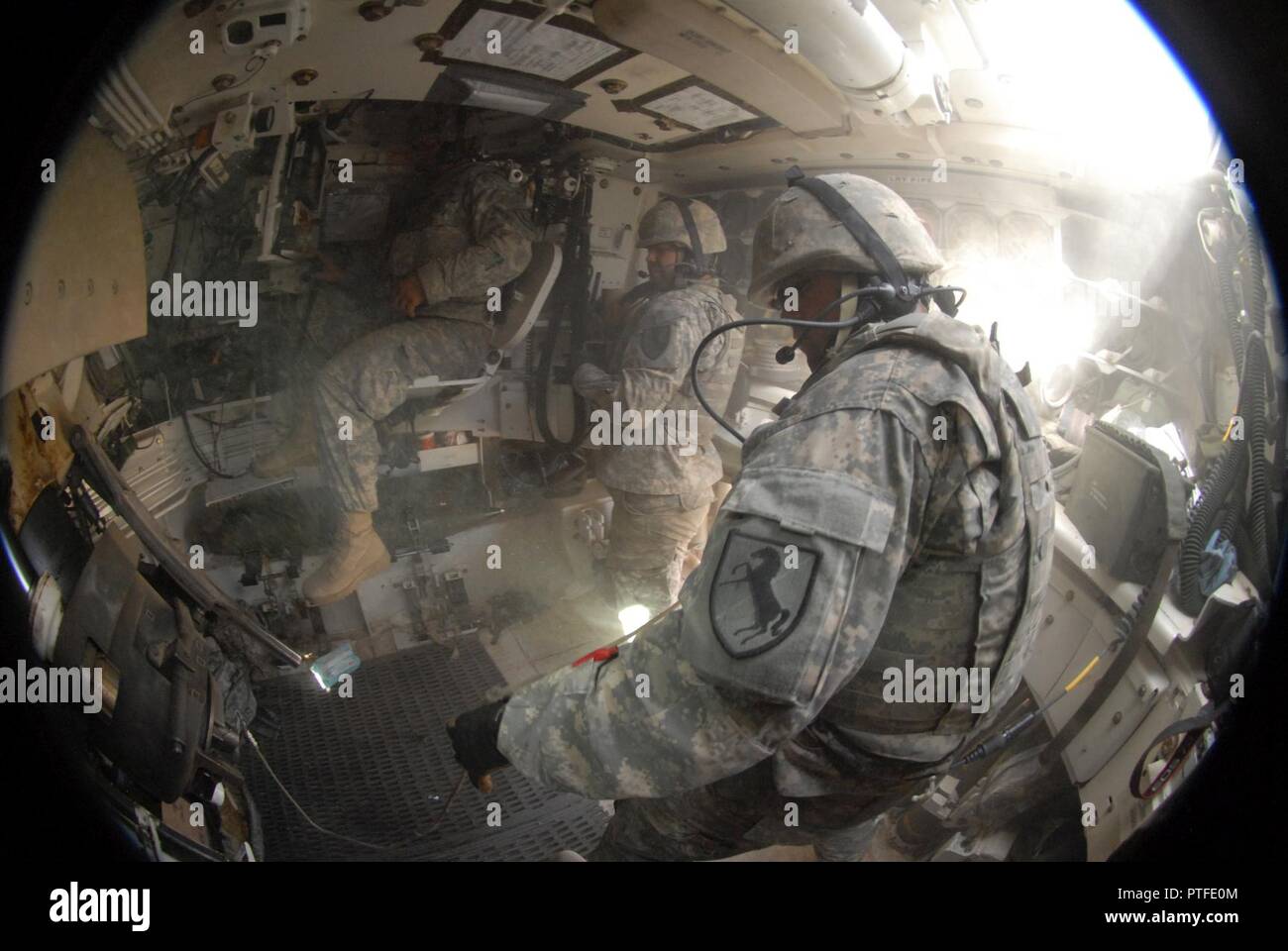 Smoke fills the inside of an M-109A6 Paladin immediately after Pvt ...