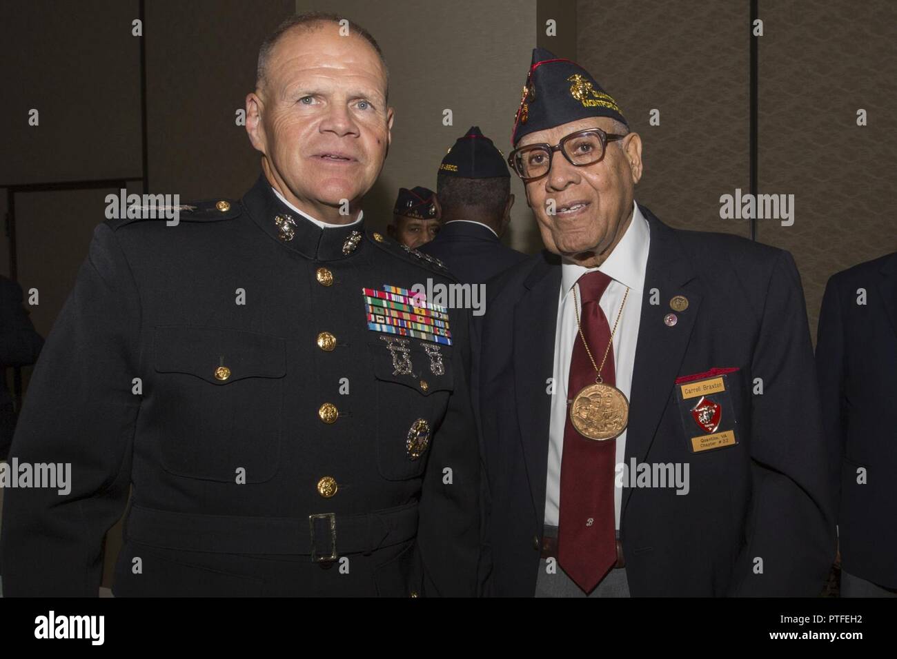 Commandant of the Marine Corps Gen. Robert B. Neller, left, poses for a ...