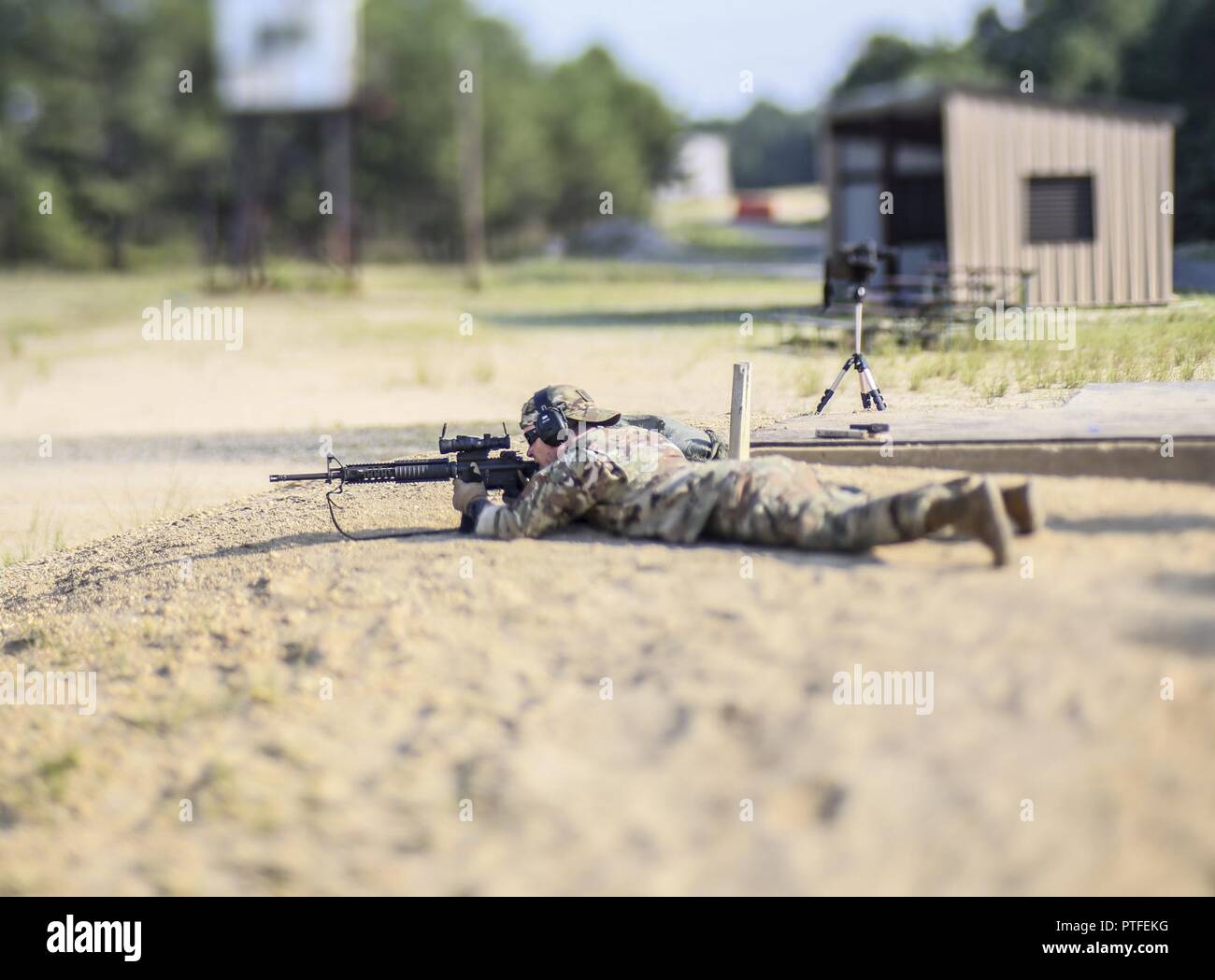 A U.S. Army Soldier fires an M16A4 rifle during the Squad Designated ...