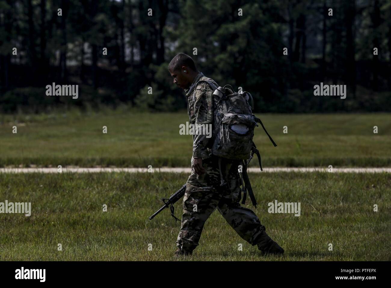 A U.S. Army Soldier moves between firing positions during the Squad ...