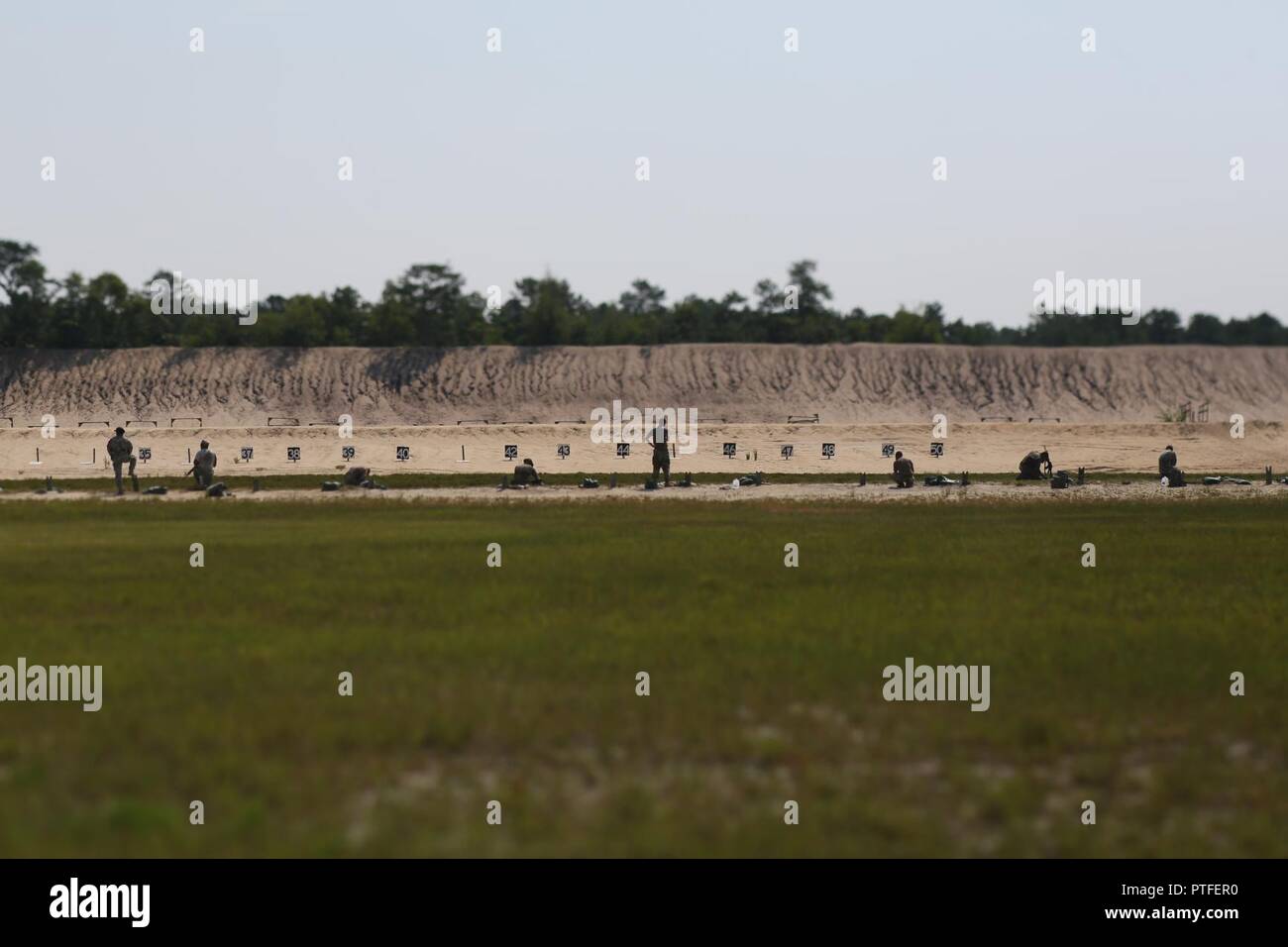 U.S. Army Soldiers fire the M16A4 rifle during the Squad Designated ...