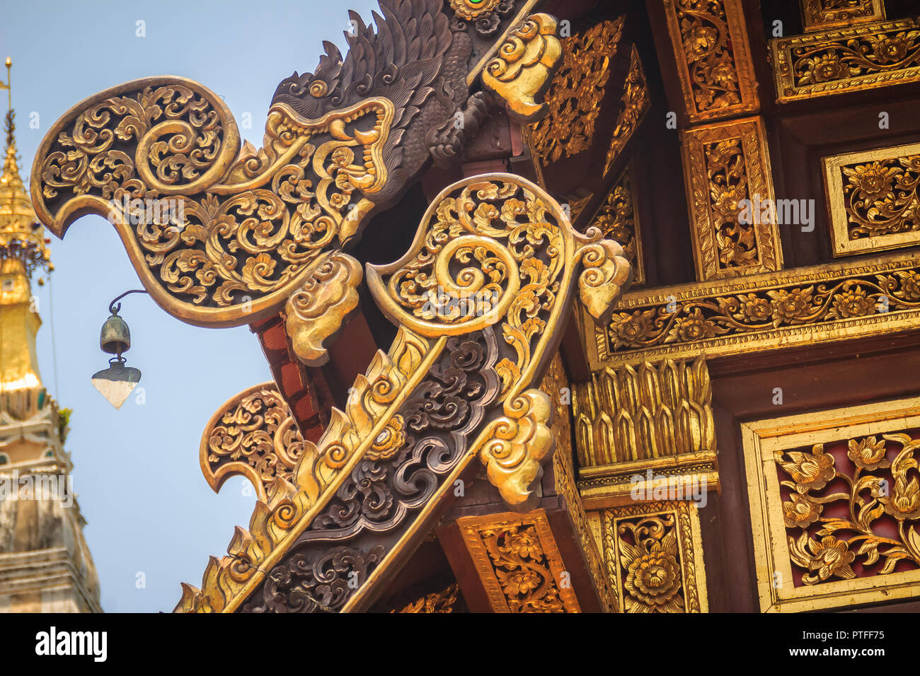 Beautiful craved naga pattern on the rafter and gable of the Thai's ...