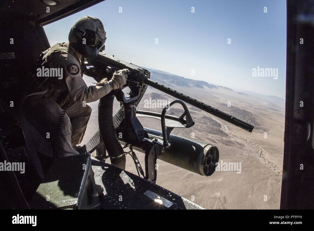 U.S. Marine Corps Staff Sgt. Ryan D. Peek, an aerial observer, with ...