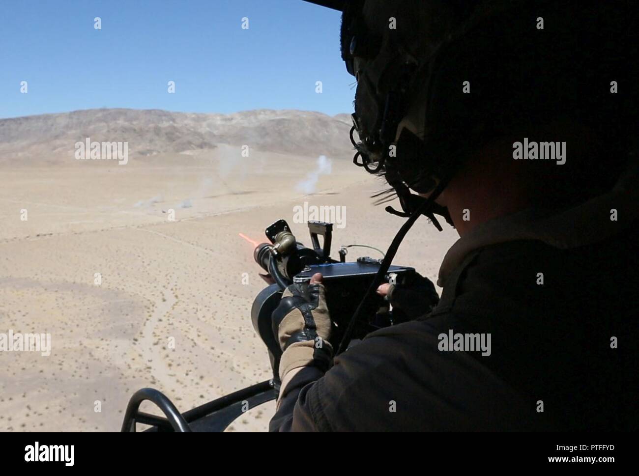 U.S. Marine Corps Staff Sgt. Dustin S. Miller, Crew Chief with Marine ...