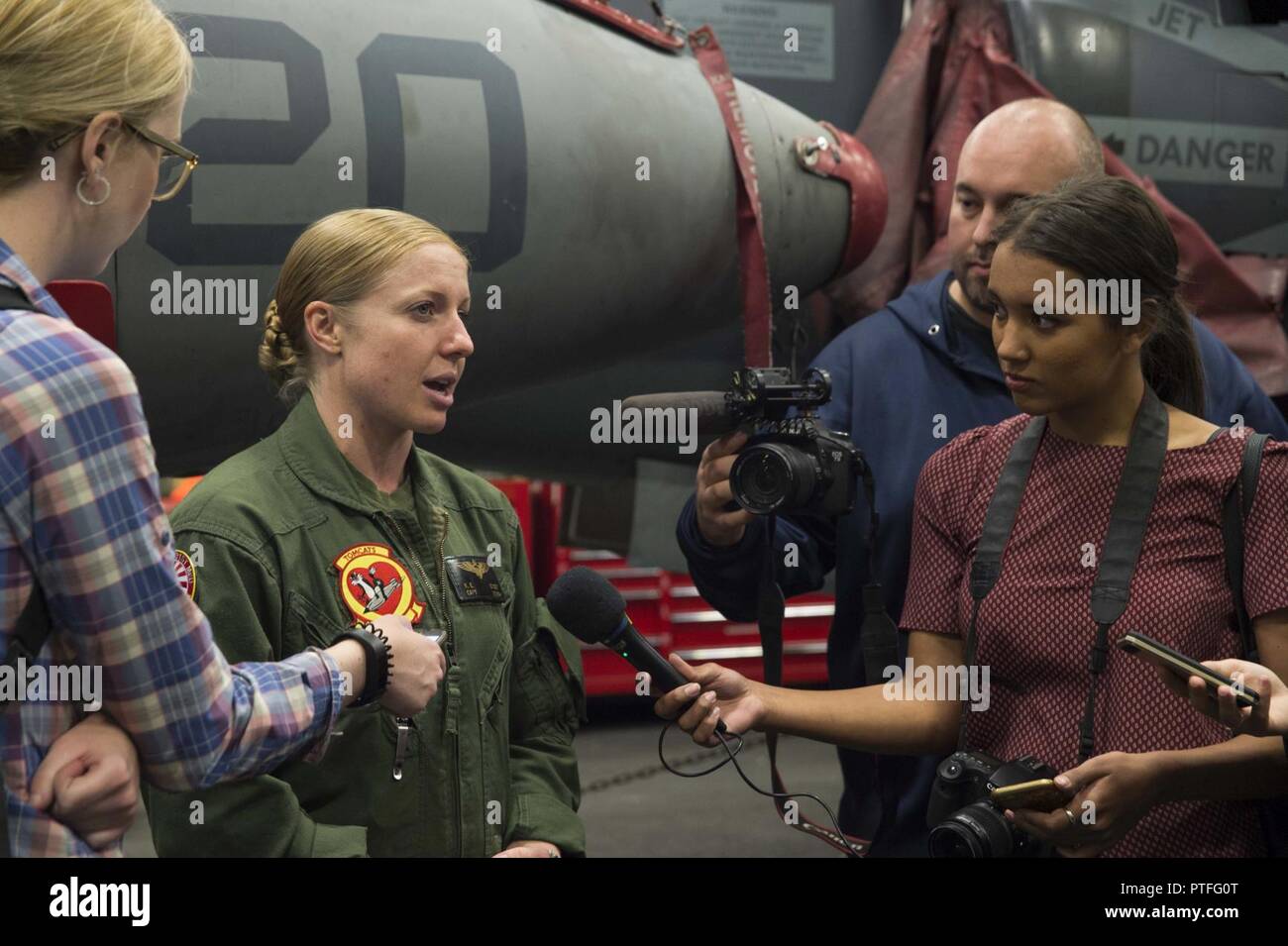 CORAL SEA (July 20, 2017) Media personnel interview Marine Capt. Kelsey ...