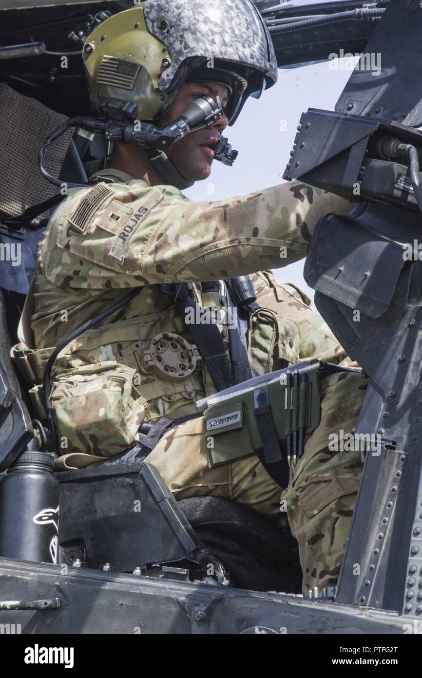 Chief Warrant Officer 3 Stephen Rojas, an AH-64 Apache helicopter pilot ...