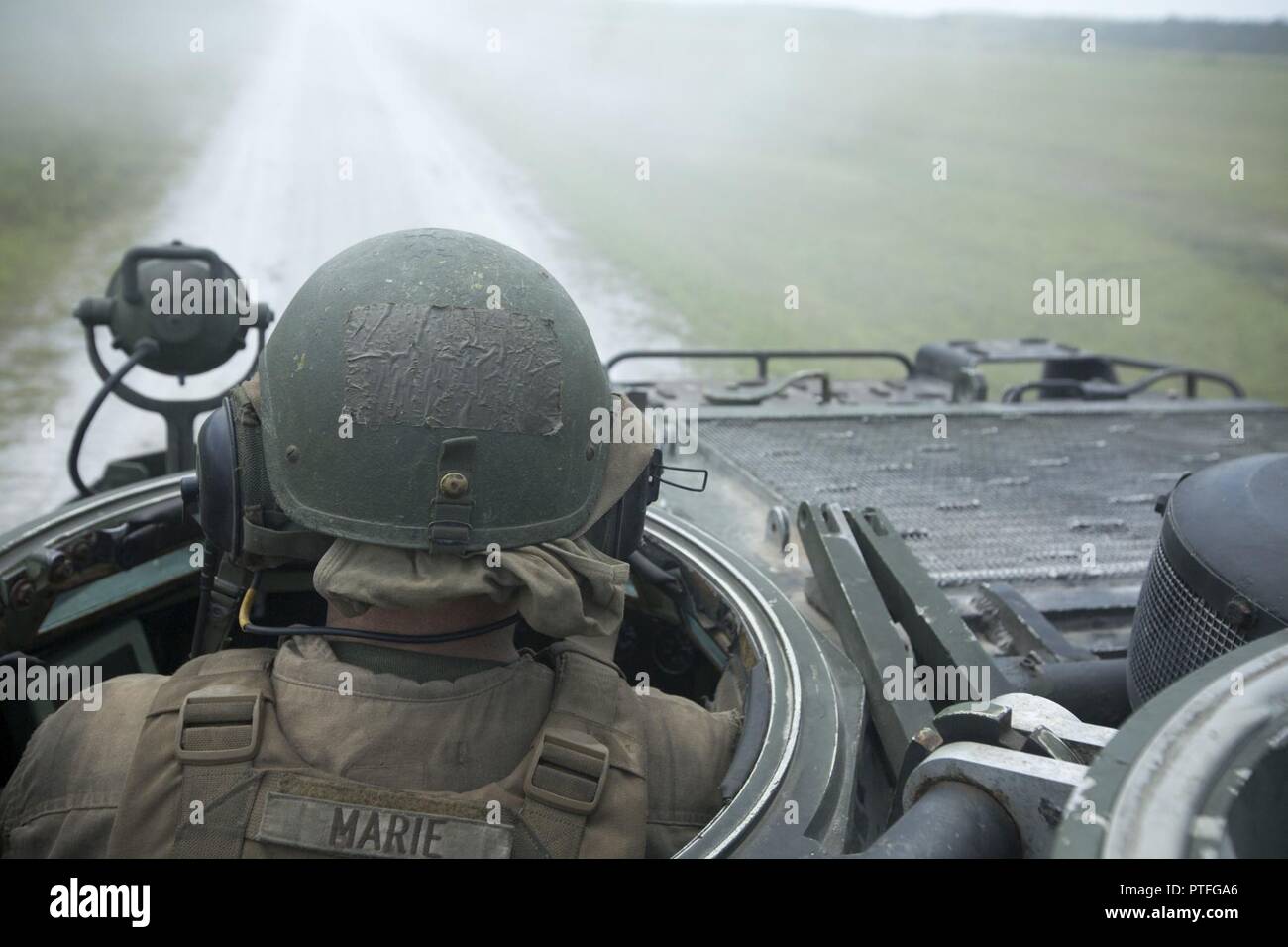 U.S. Marine Corps Lance Cpl. Eric Marie, assault amphibious vehicle ...