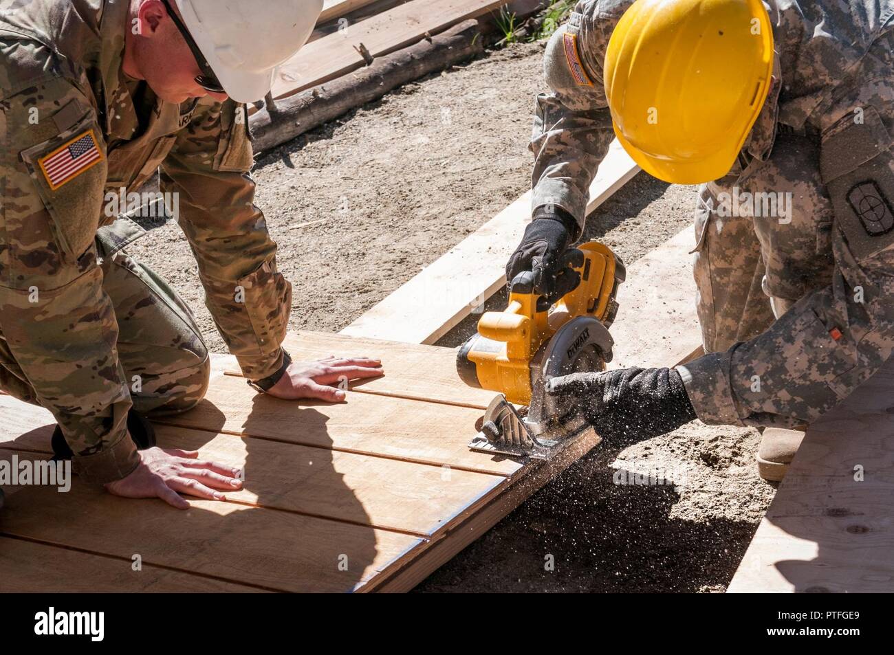 U.S. Army Reserve Pfc. Dylan Burgess, at left, and Spc. Gage Dean, both ...