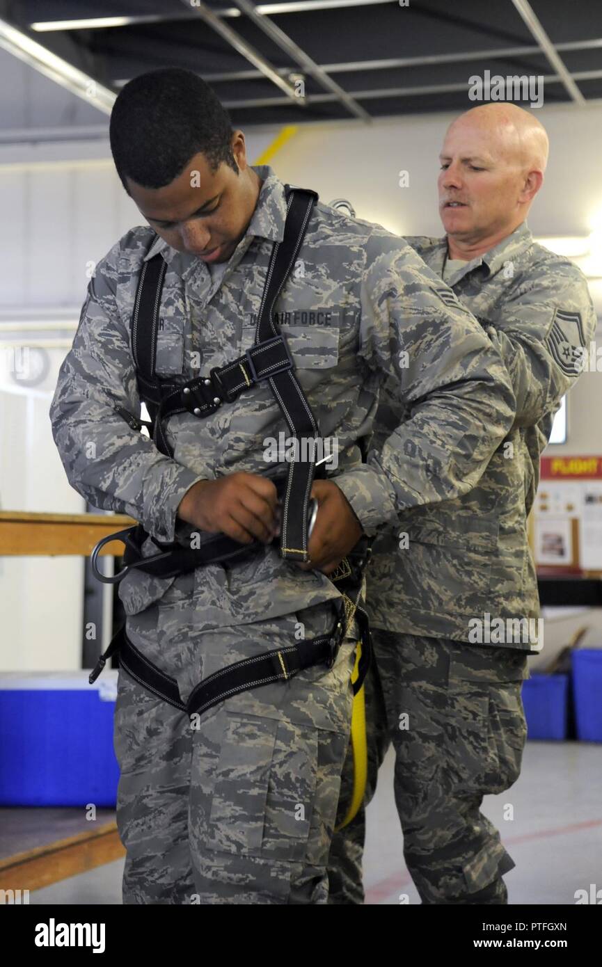 Oregon Air National Guard Senior Airman William Butler, (left) assigned ...