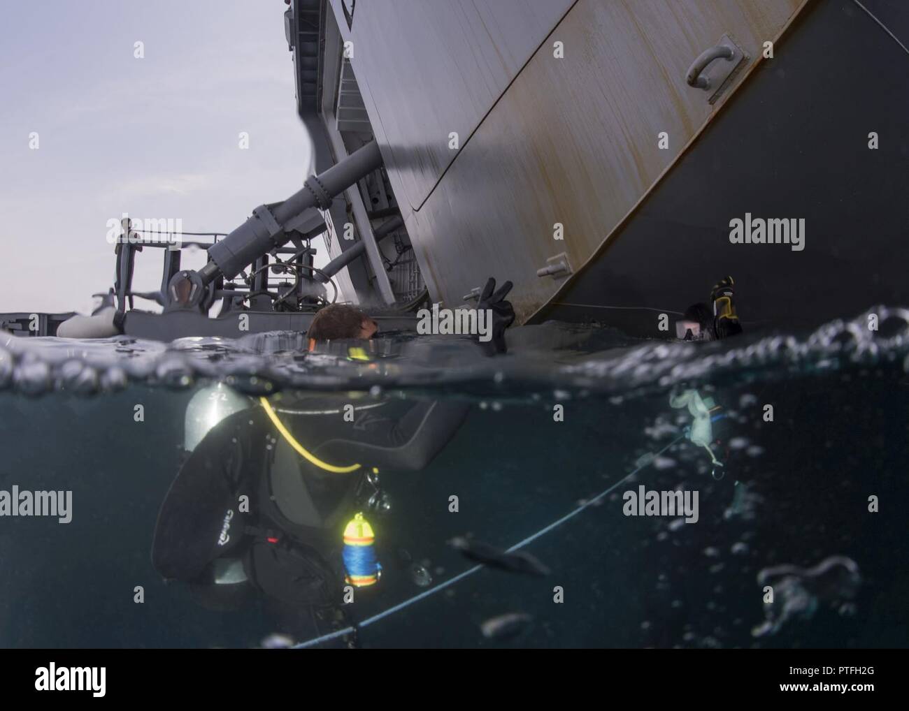 Explosive ordnance disposal technicians, assigned to Explosive Ordnance ...