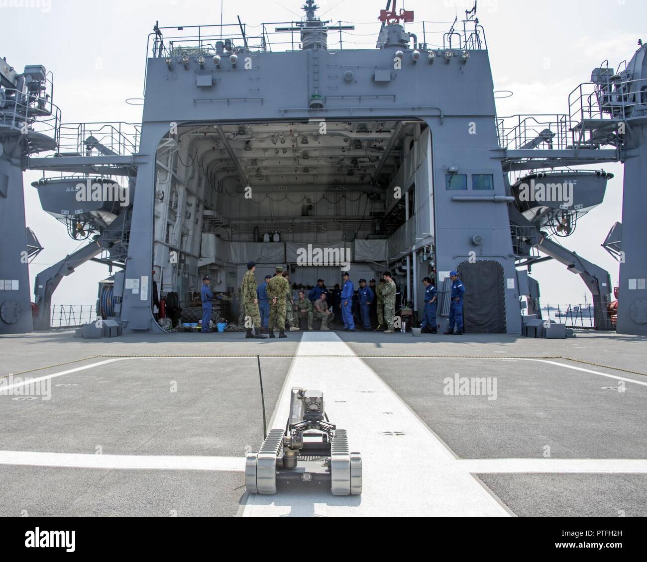 Explosive ordnance disposal technicians assigned to Explosive Ordnance ...