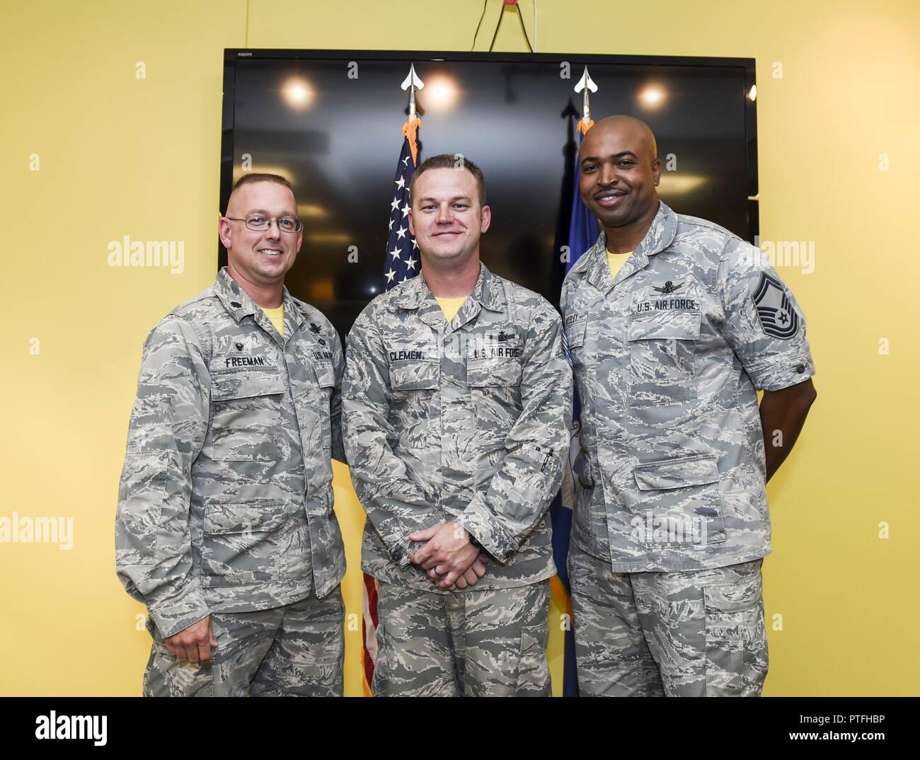 Team Buckley members receive a congratulatory "tacking on" of their new ...