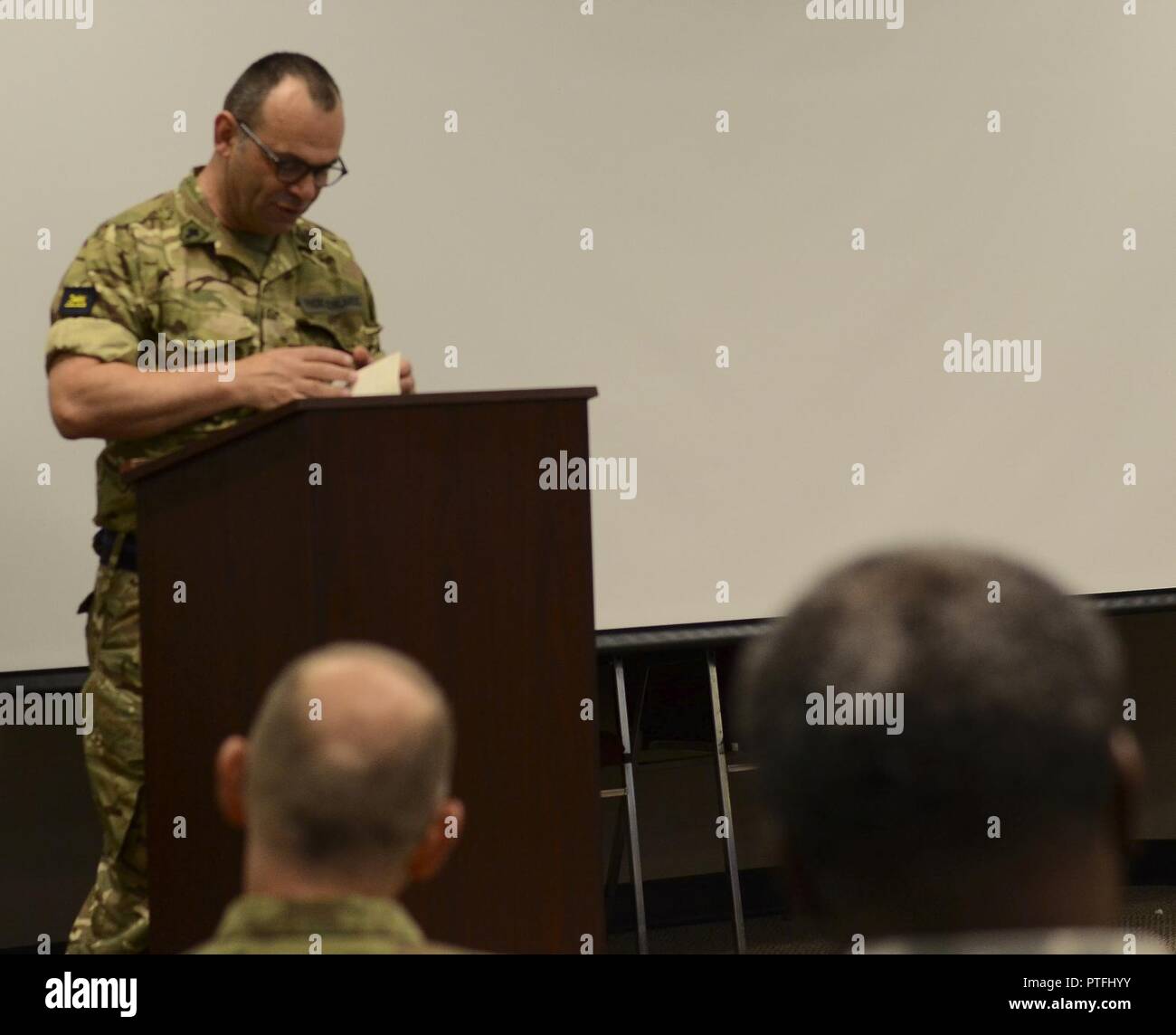 Padre Simon Rowlands presents the scripture reading during religious ...