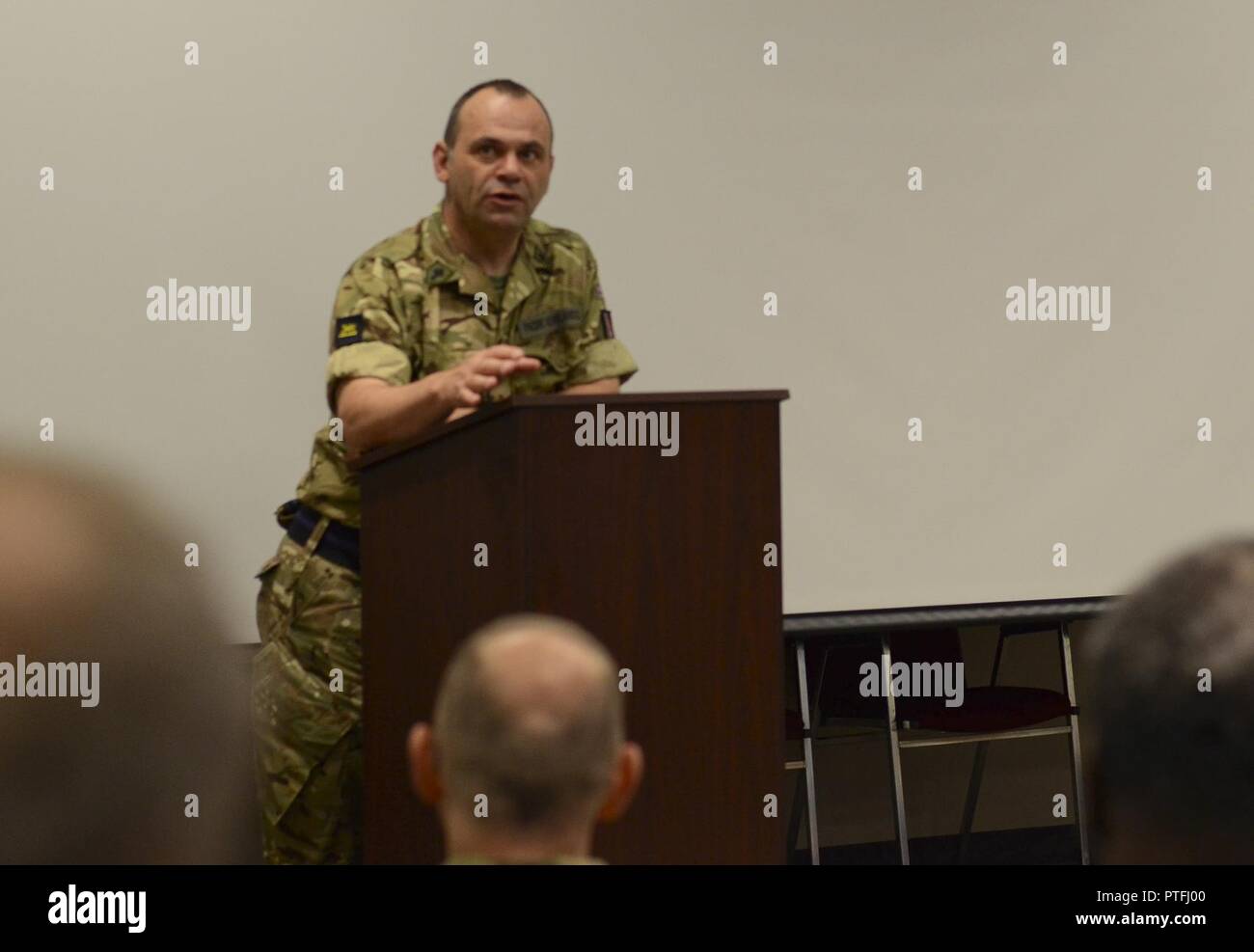 Padre Simon Rowlands gives the sermon during religious services to ...