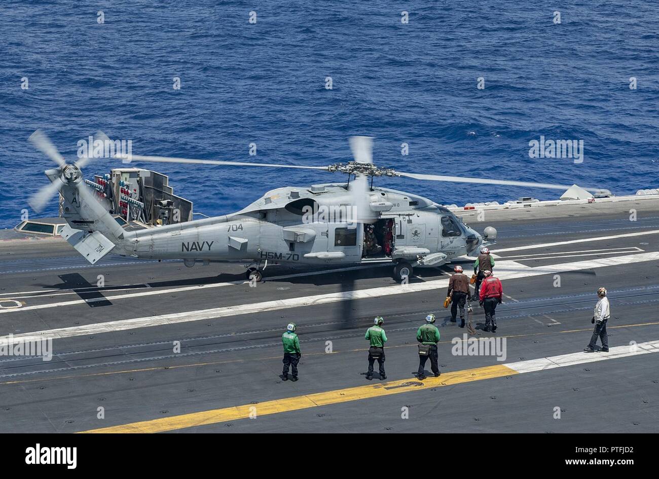 MEDITERRANEAN SEA (July 19, 2017) Sailors move towards an MH-60R Sea ...